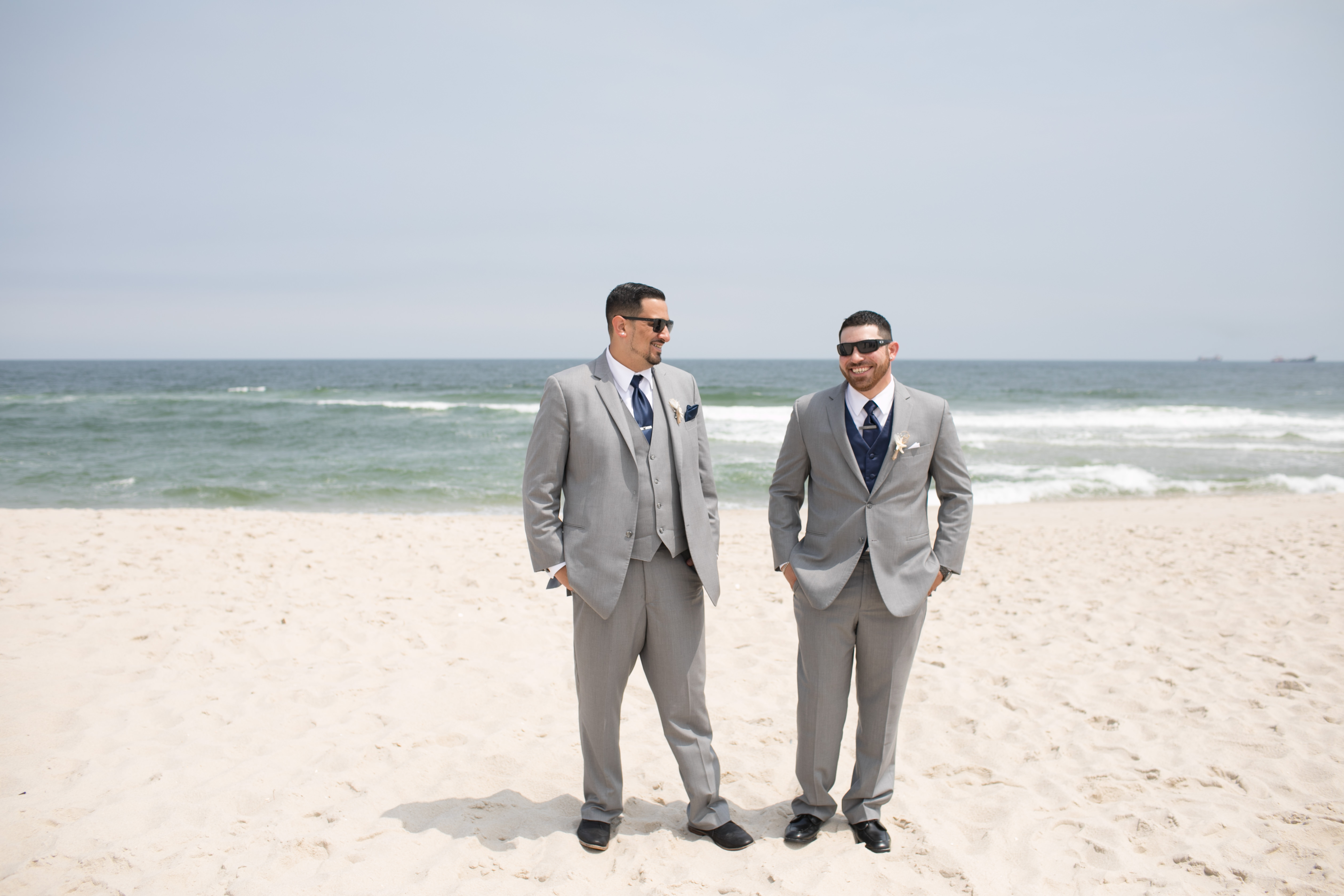 groomsman and groom laughing